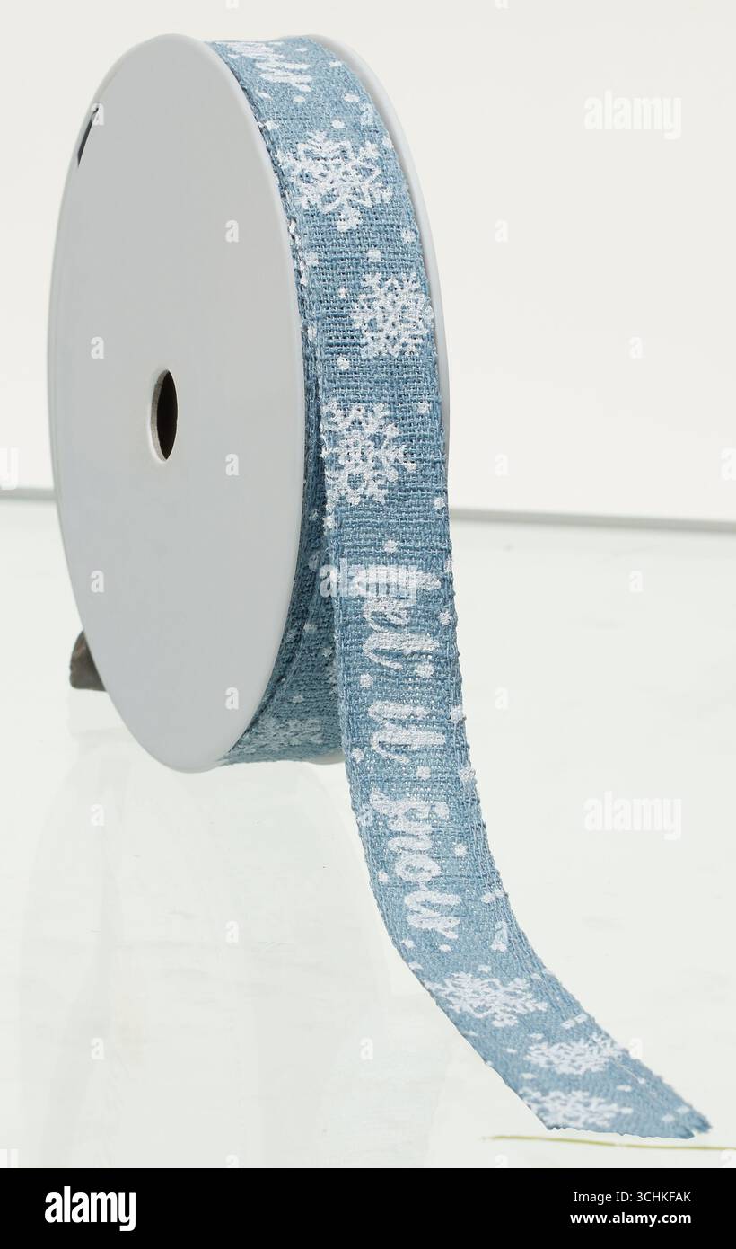 Roll of blue thin ribbon isolated nature background with clipping path ...