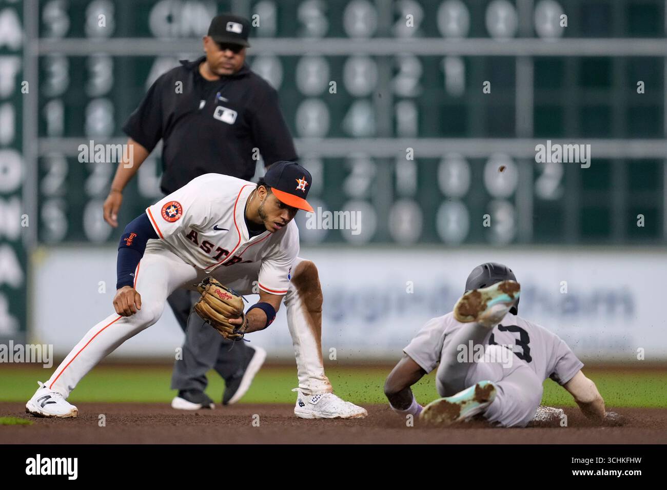 New York Yankees' Jazz Chisholm Jr. (13) steals second ahead of a throw to Houston Astros ...