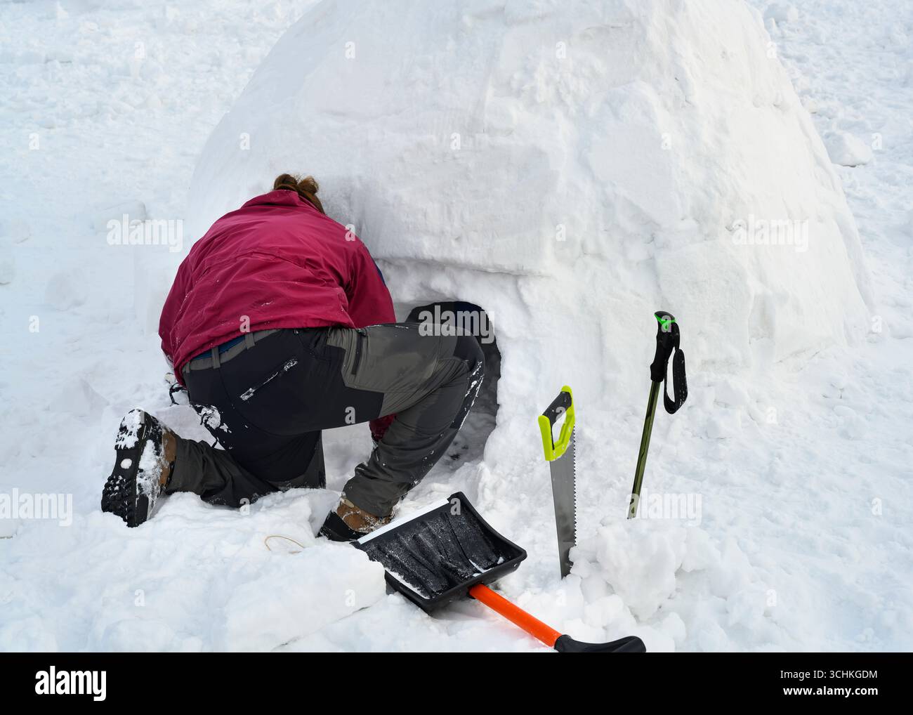 The man builds an igloo, a national shelter from the cold of the ...