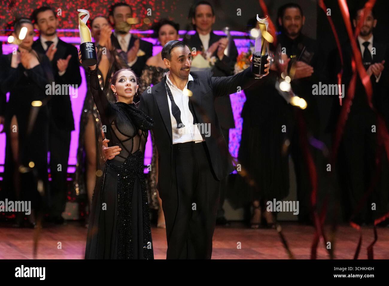 Leandro Bojko and Micaela Garcia react after winning the stage category ...