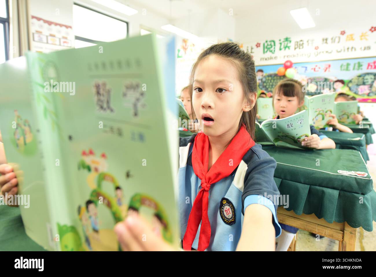 Students return to school campus as the autumn semester kicks off in ...