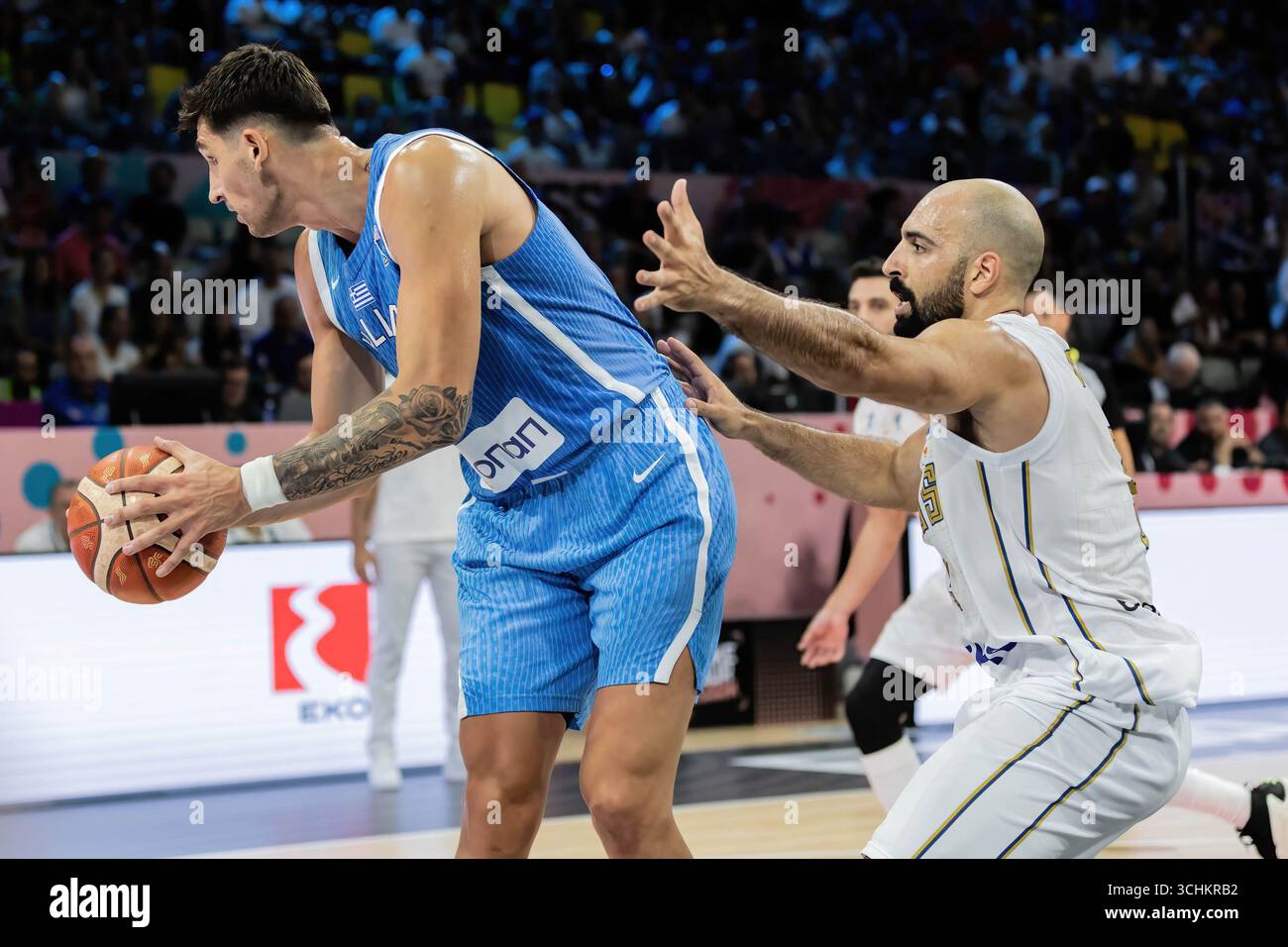 Alexandros Samodurov (L) of Greece and Simon Michail (R) of Cyprus are ...