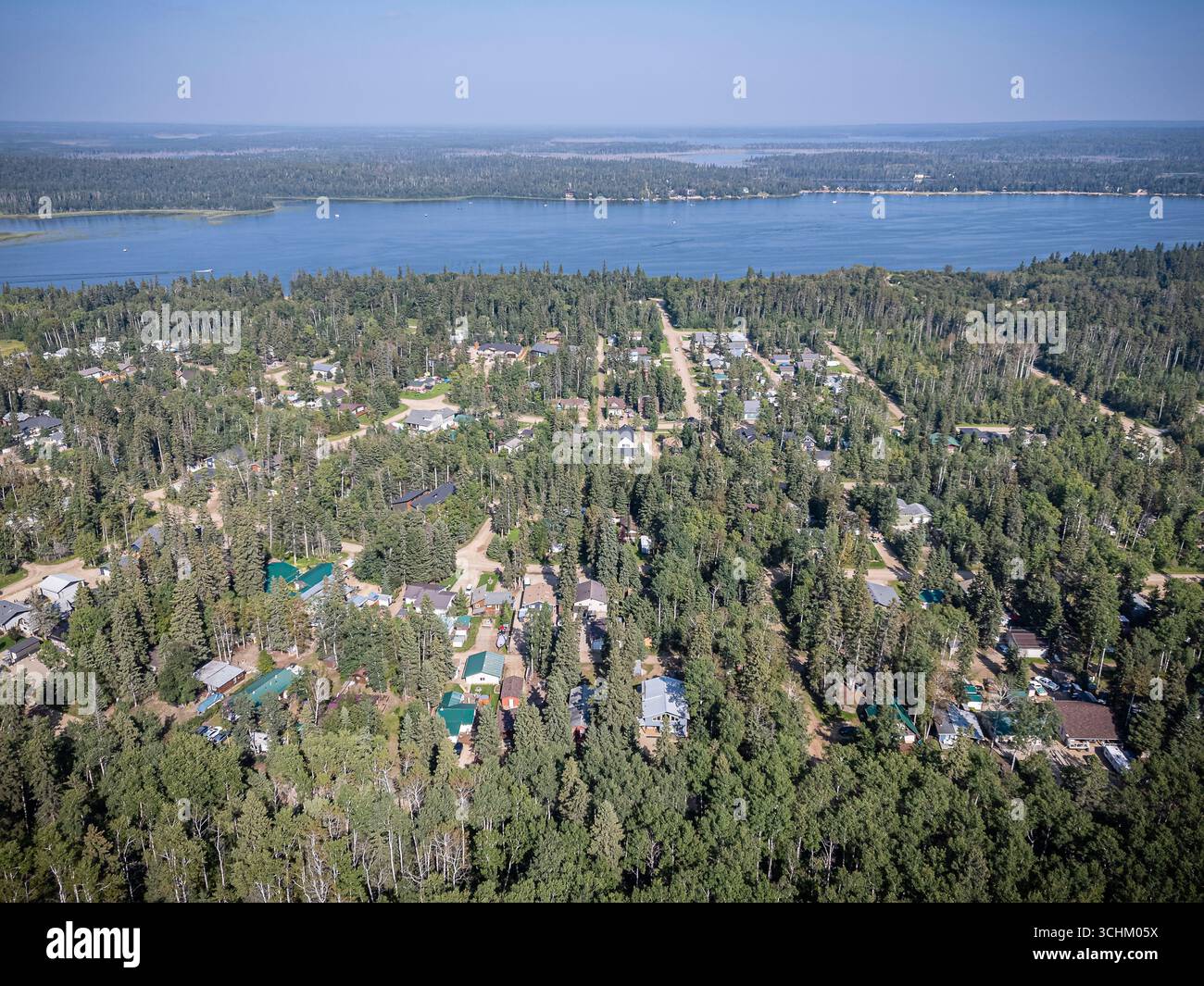 An aerial drone photo of Emma Lake, Saskatchewan, in summer, featuring ...