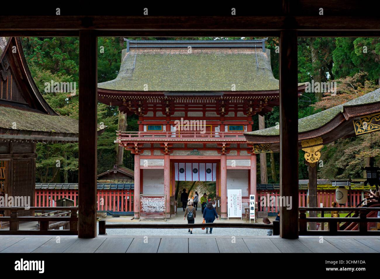 Visitors leaving through the two-story main gate building of the ...