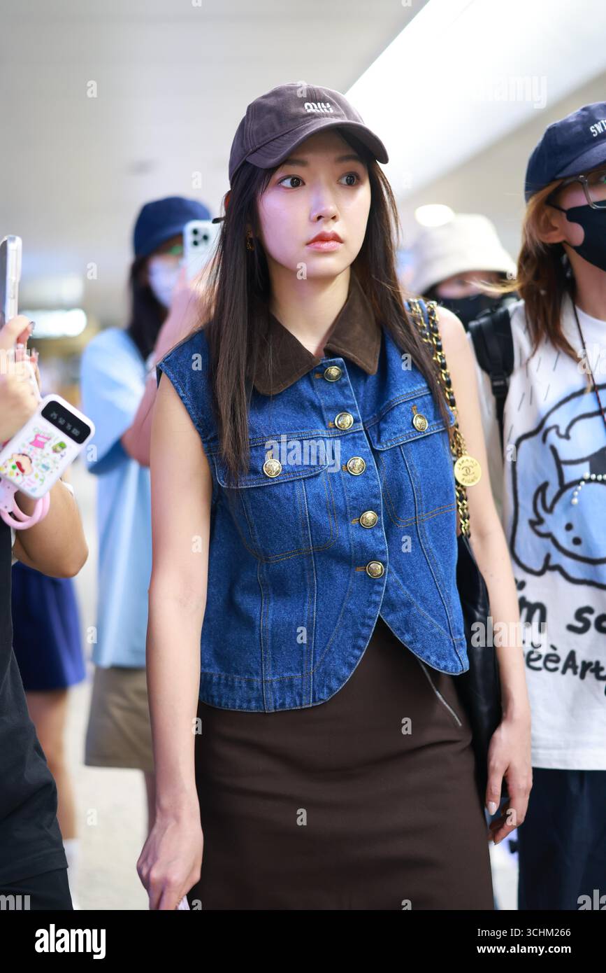 Chinese singer, dancer and actress Cheng Xiao appears at the airport in ...