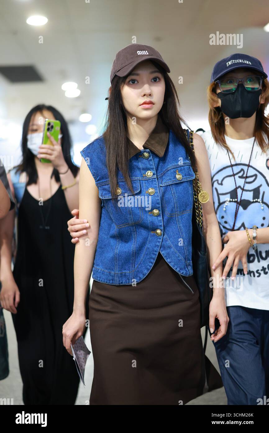 Chinese singer, dancer and actress Cheng Xiao appears at the airport in ...
