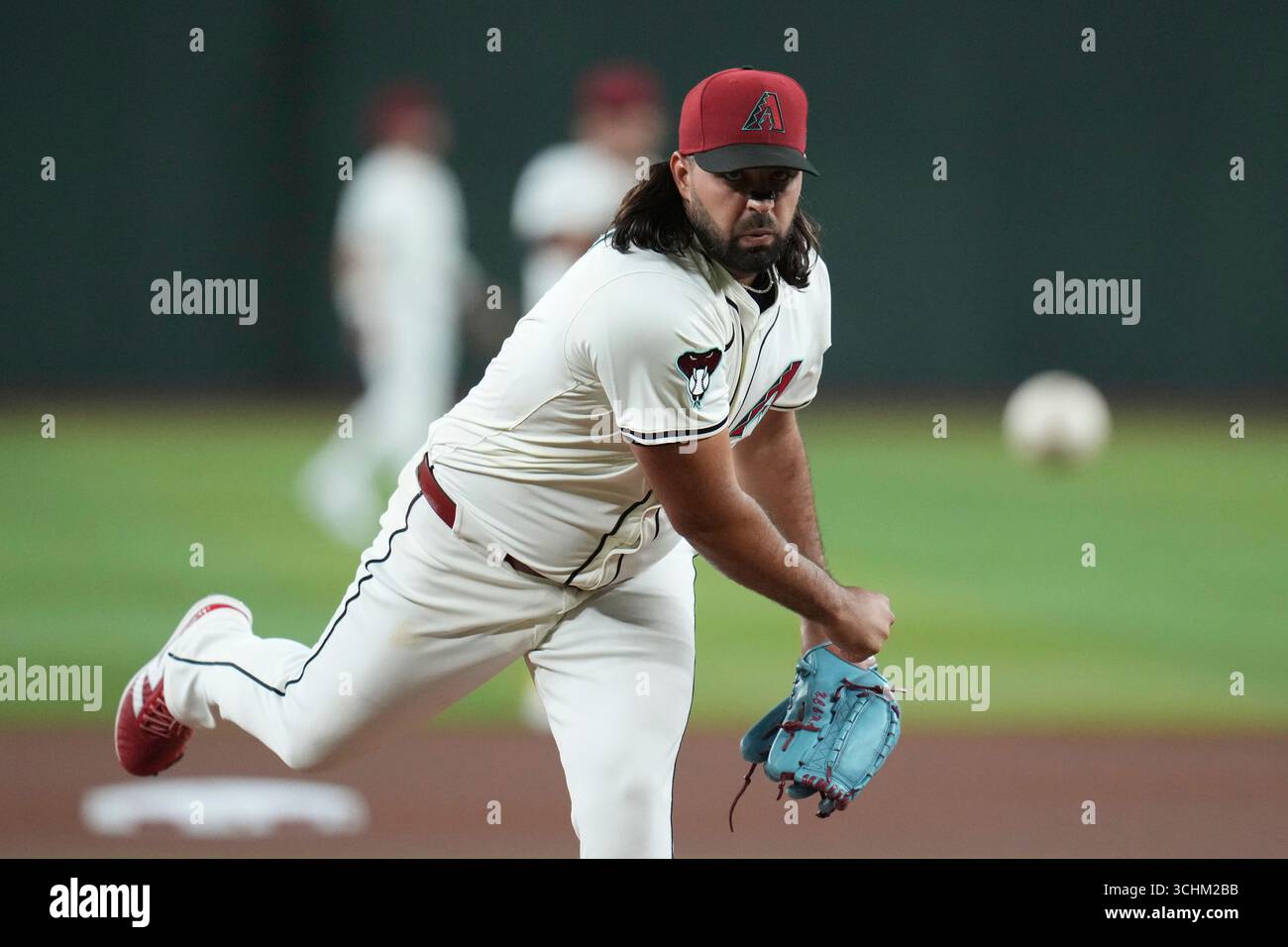 Arizona Diamondbacks starting pitcher Nabil Crismatt warms up prior to ...