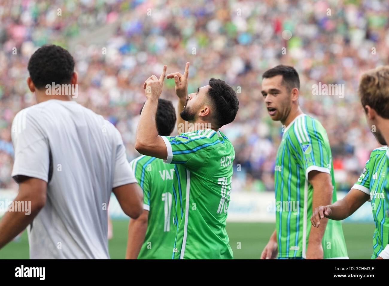 Seattle Sounders midfielder Alex Roldan (16) reacts after scoring on a ...