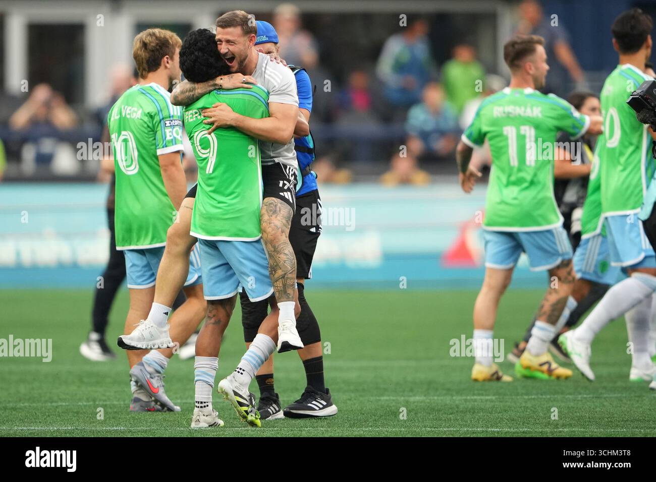 Seattle Sounders forward Paul Arriola, facing, hugs forward Jesús ...
