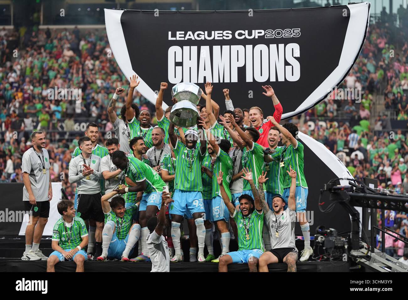 The Seattle Sounders celebrate with the Leagues Cup trophy after ...