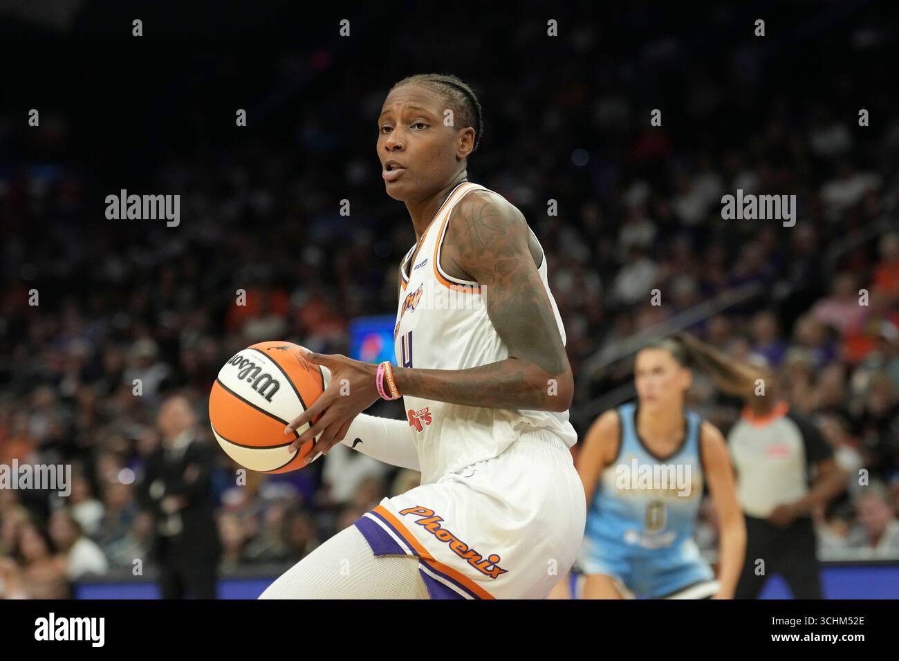 Phoenix Mercury forward Natasha Mack looks to pass the ball against the ...