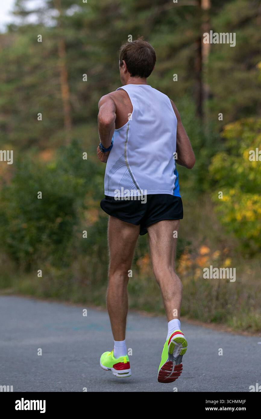 Rear view of jogger hi-res stock photography and images - Alamy