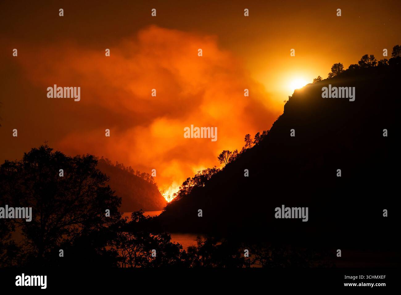 The 6-5 Fire, part of TCU September Lightning Complex, burns above the ...