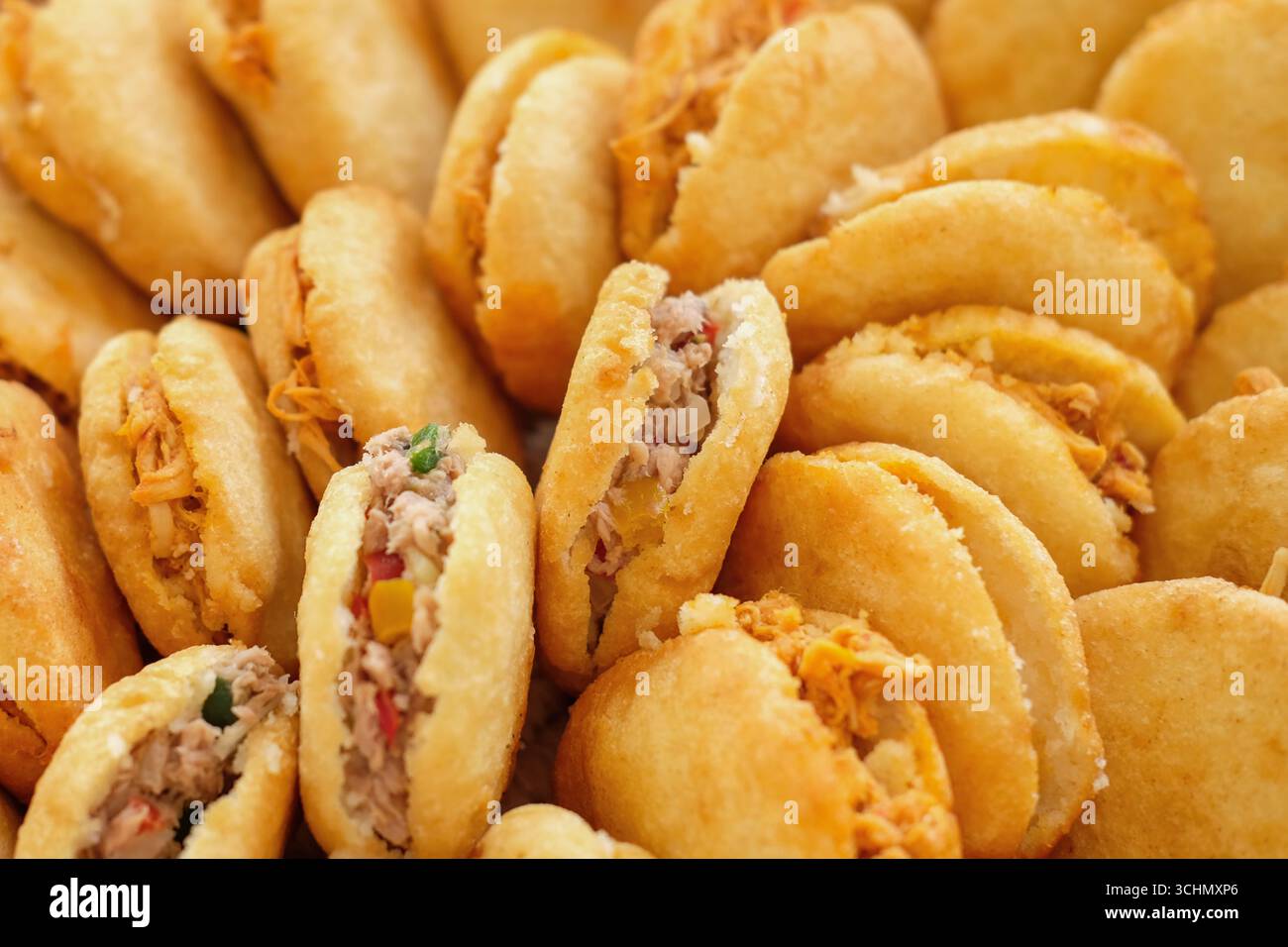Small arepa filled with carne mechada, corn patties with mince meat ...