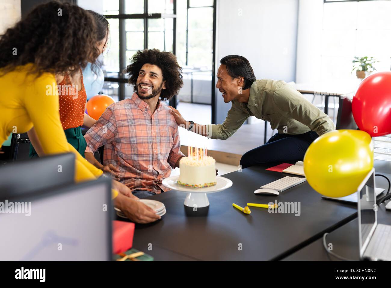 Celebrating birthday in office, diverse colleagues with cake and ...