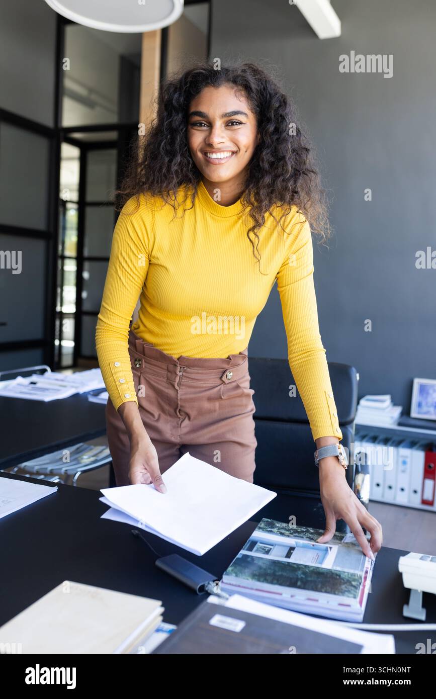 Woman organizing workspace in hi-res stock photography and images - Alamy
