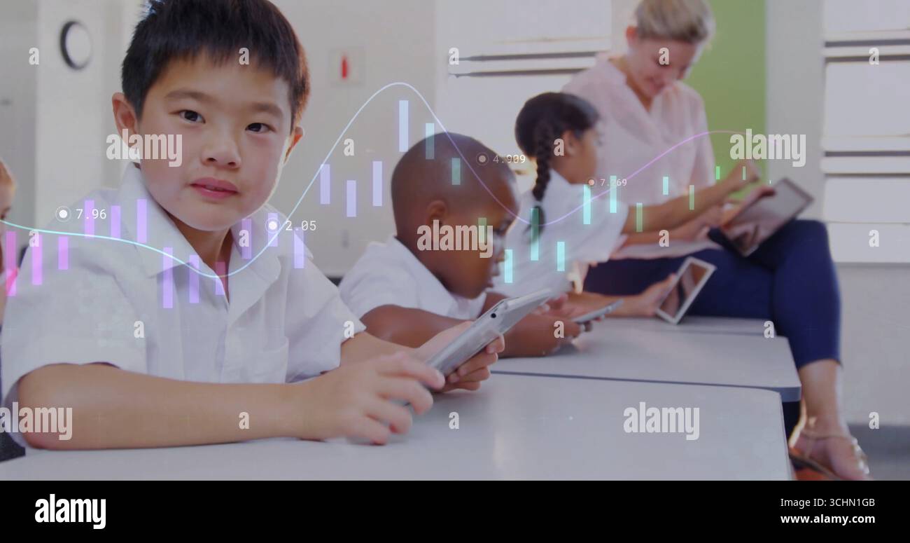 Boy sitting desk tapping tablet hi-res stock photography and images - Alamy