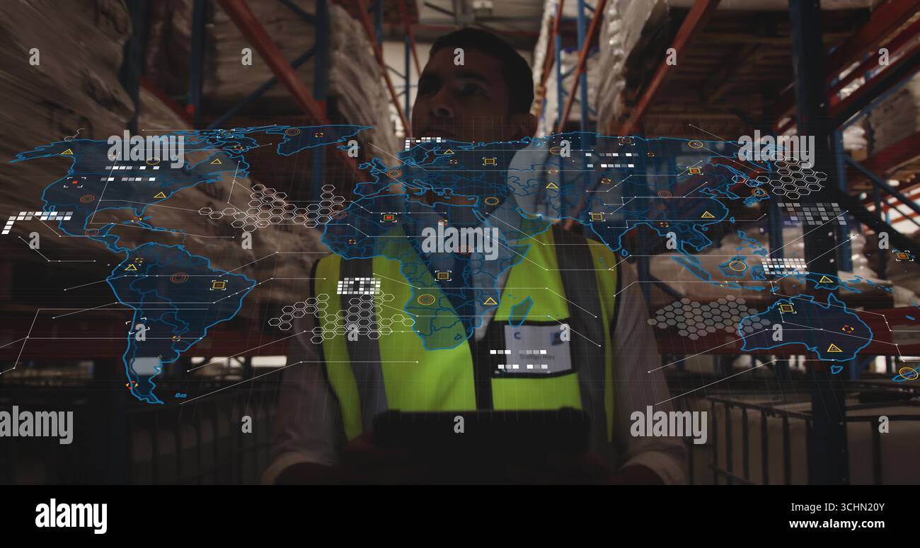 Using tablet hi-vis vest clad worker viewing digital map overlay in ...