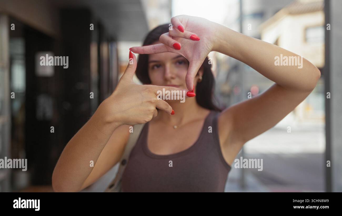 Woman framing hands rectangle smiling hi-res stock photography and ...