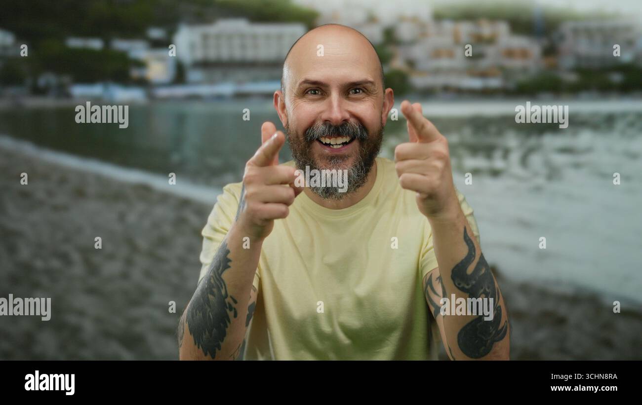 Man beard tattoos playfully gazing hi-res stock photography and images ...