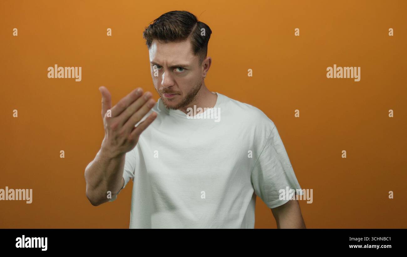 Young man beard gestures angrily hi-res stock photography and images ...