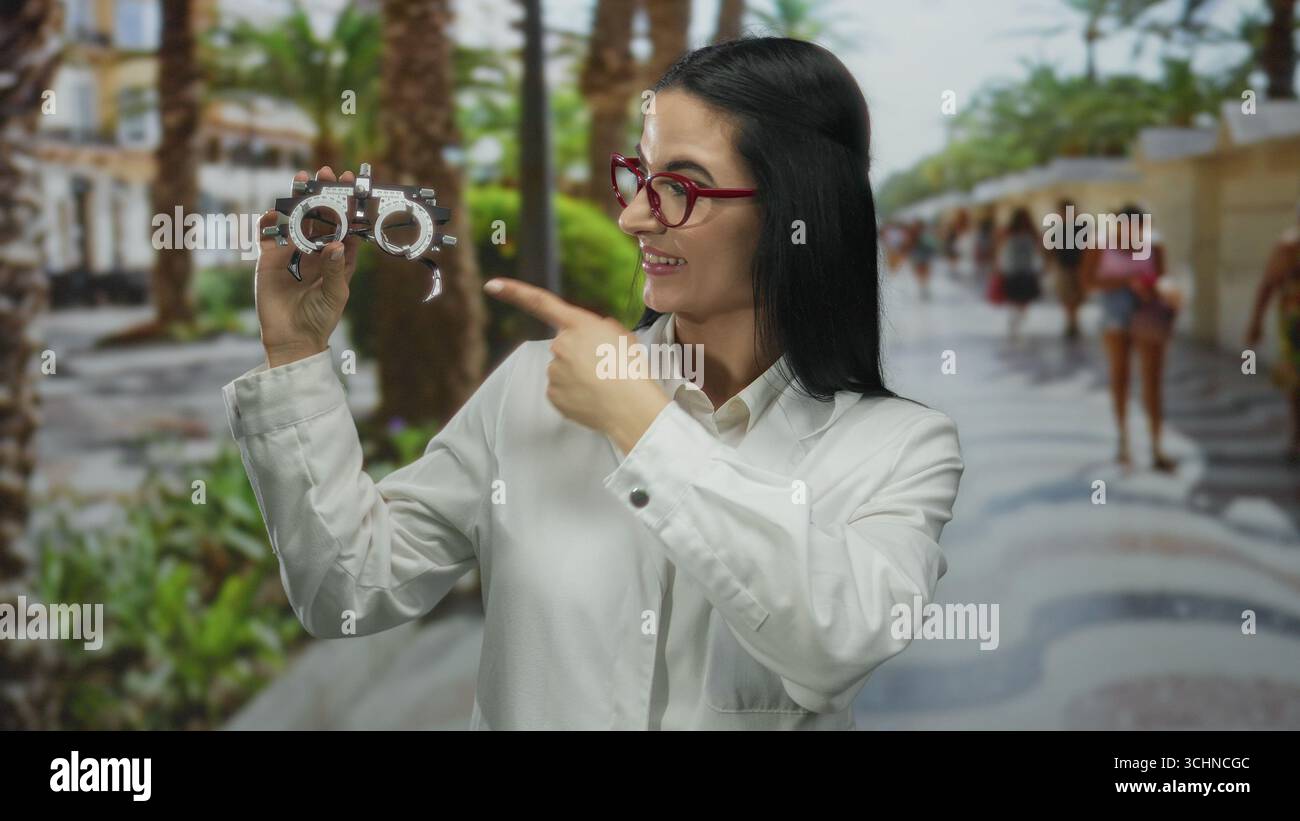 Hispanic female optician wearing glasses hi-res stock photography and ...