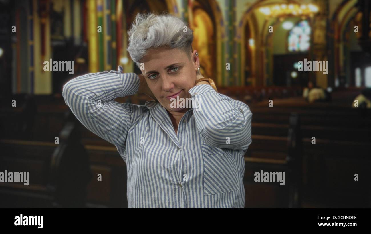 Woman raising arms tilting head hi-res stock photography and images - Alamy