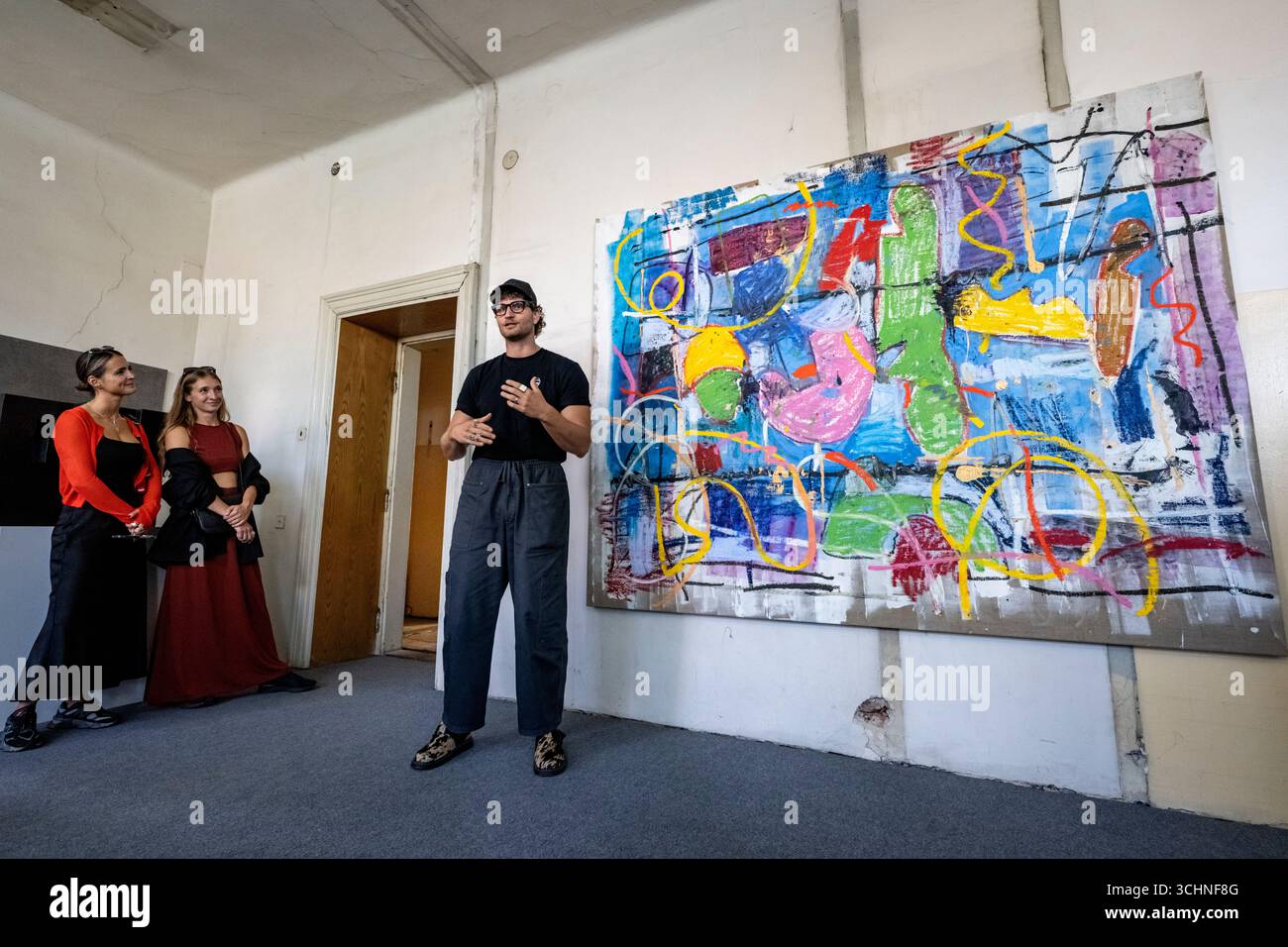 Painter Martin Lukac in front of his painting during the Art Index Pop ...