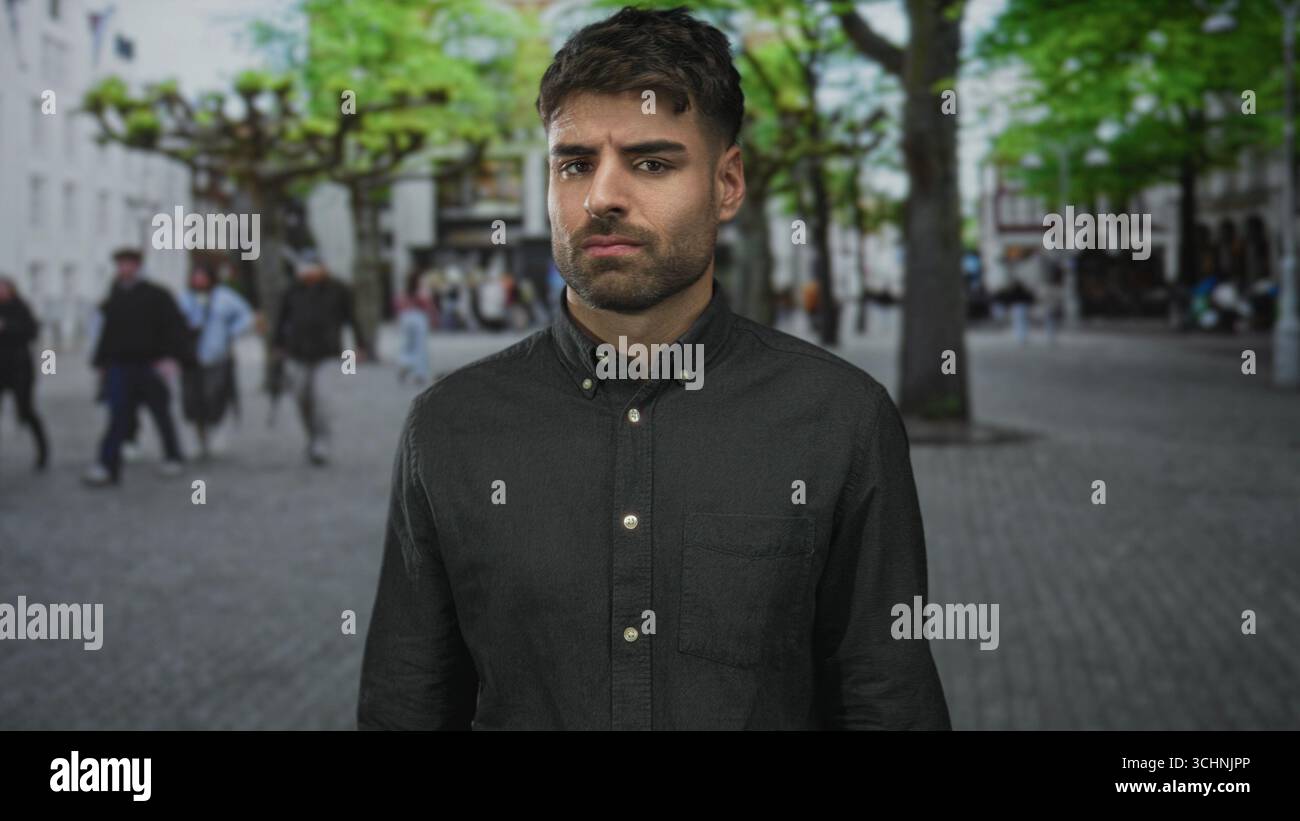 Young hispanic man furrowed hi-res stock photography and images - Alamy