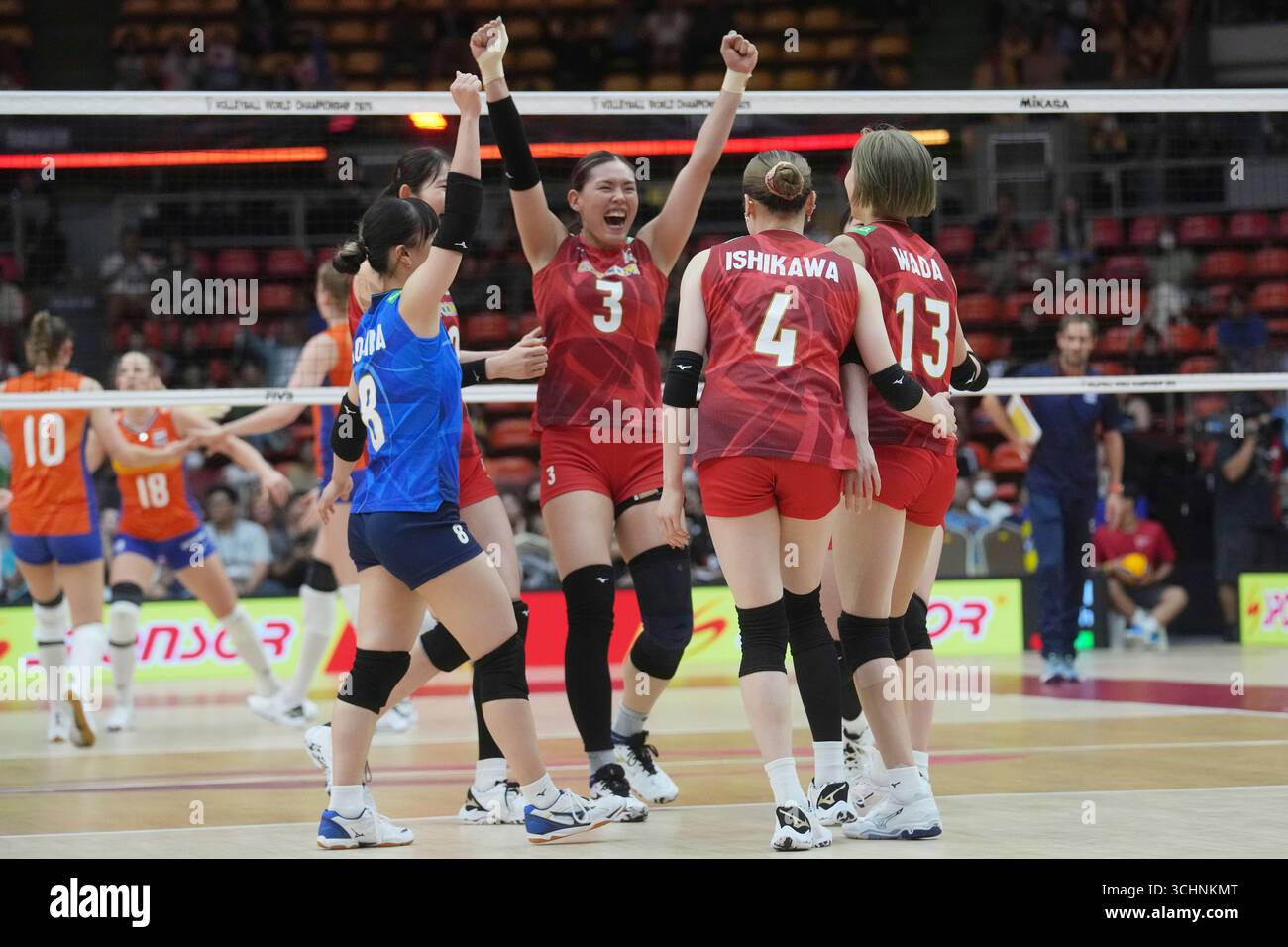 Japan players celebrate after scoring a point against Netherlands ...