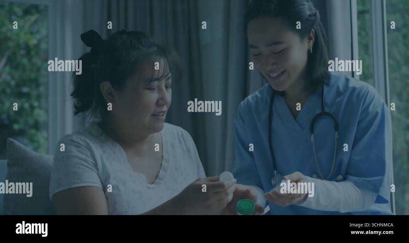 Guiding nurse in blue hi-res stock photography and images - Alamy
