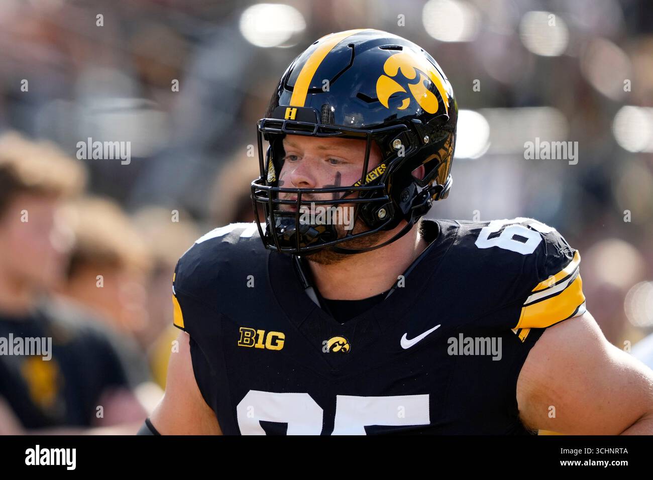 Iowa offensive lineman Logan Jones warms up before an NCAA college ...