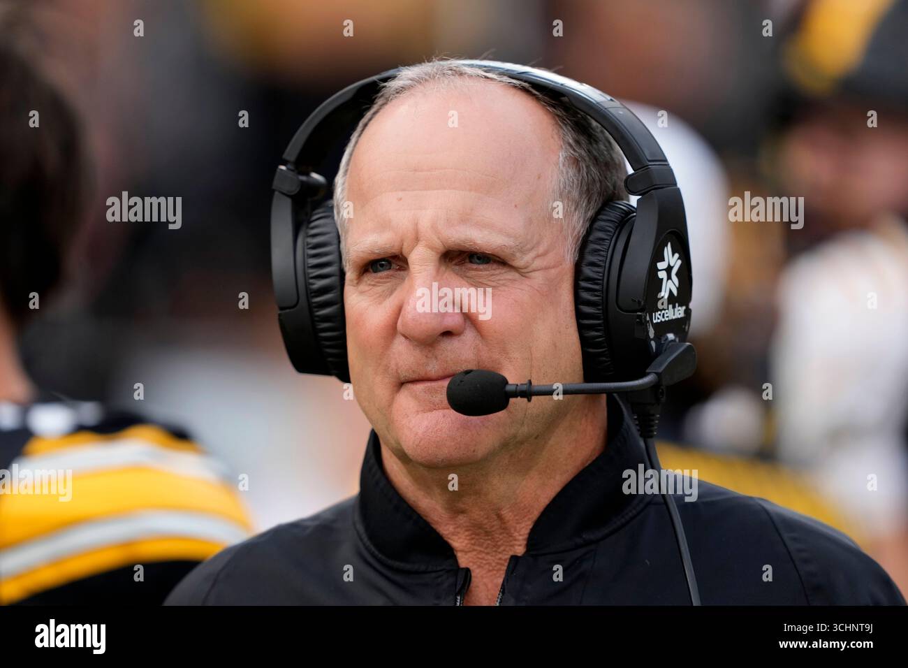 Iowa defensive coordinator Phil Parker stands on the field before an NCAA college football game ...