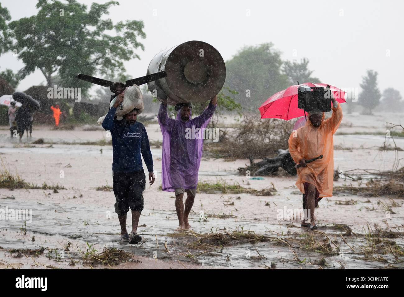 Residents evacuate their homes and move to safer areas after the River ...