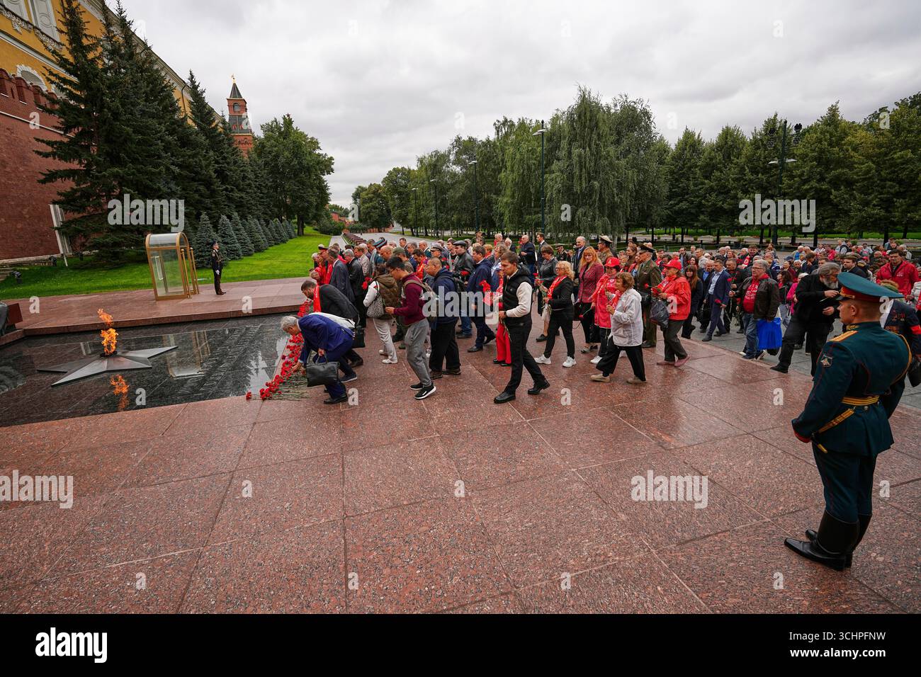 Russia communist's party supporters lay wreaths and flowers at the Tomb ...