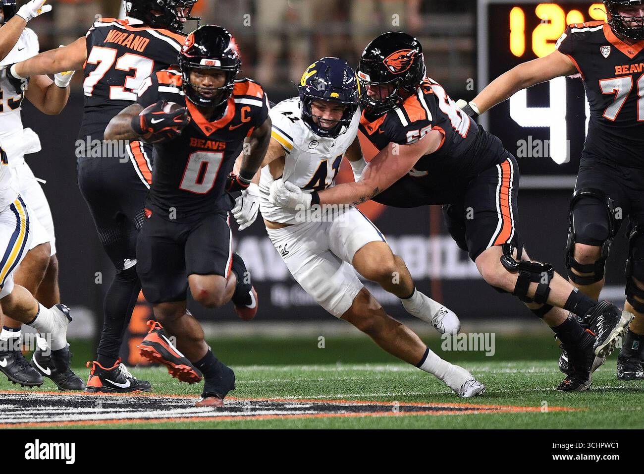 Oregon State Beavers running back Anthony Hankerson (0) breaks the ...