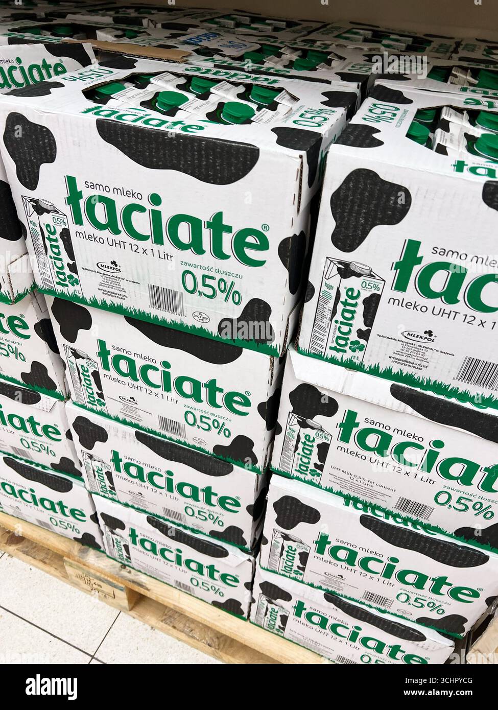 Rzeszow, Poland - August 22, 2025: Cartons of UHT Laciate milk with 0.5 ...