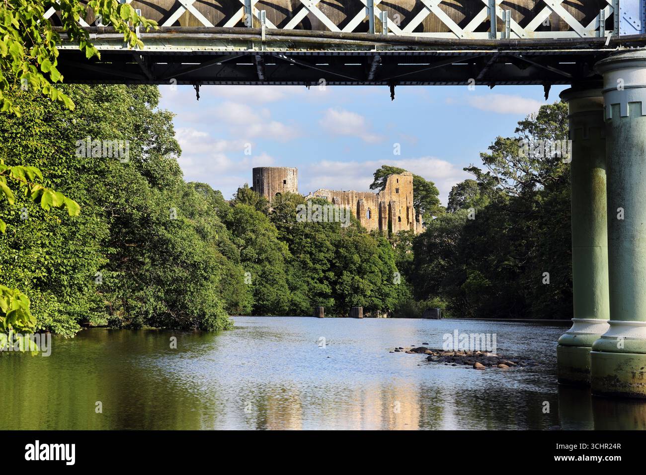 The medieval Castle of Barnard Castle framed by the Deepdale aqueduct ...