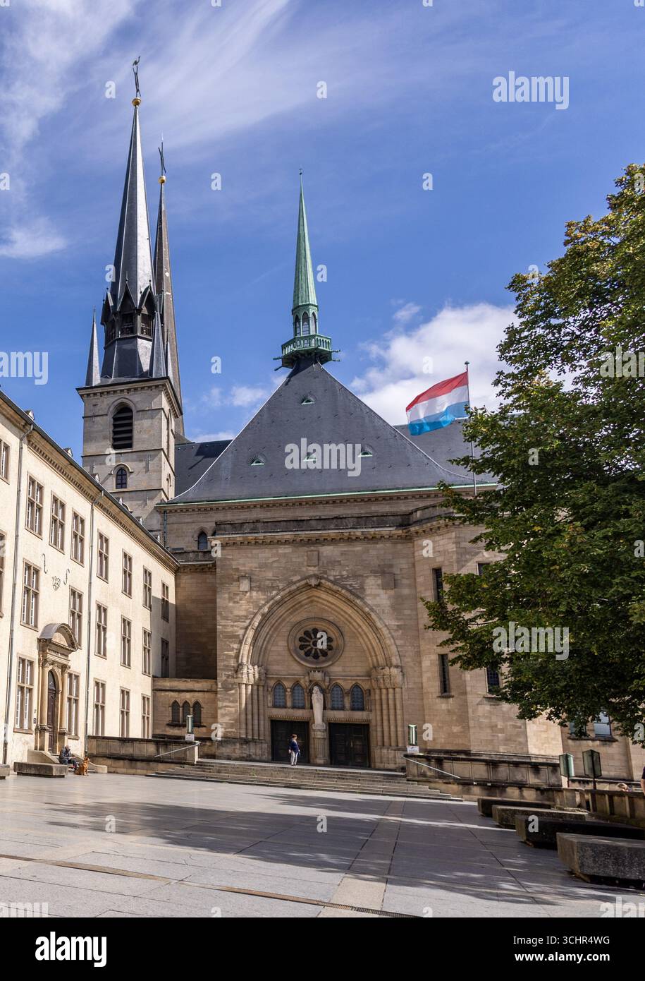 LUXEMBOURG, EUROPE - SEPTEMBER 1, 2025 - Notre Dame Cathedral waving ...