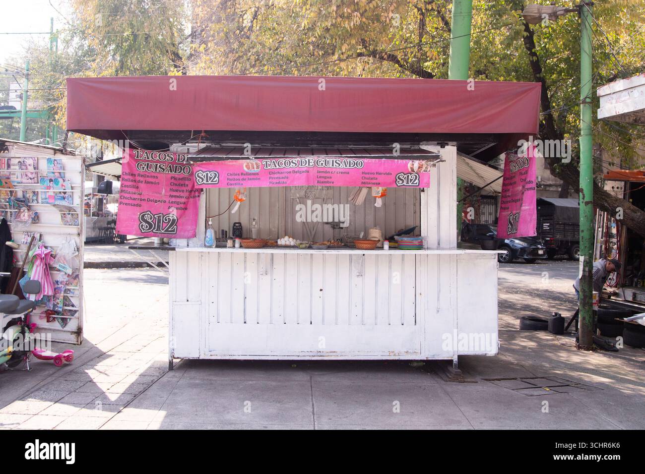 Mexico City, Mexico; November 1, 2025: Street-level restaurants and ...