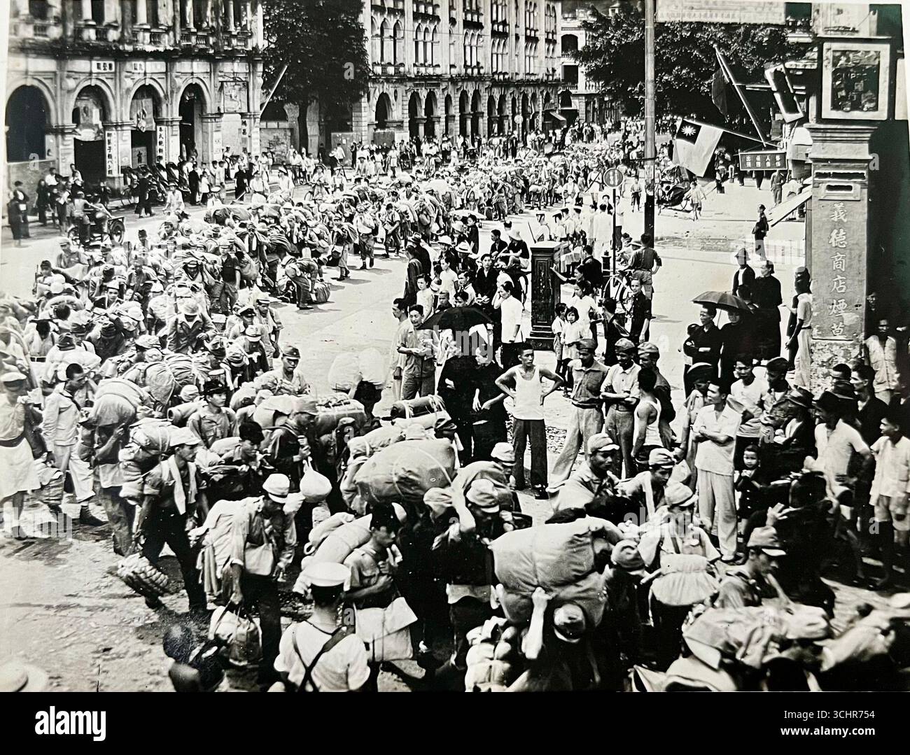 Japanese soldiers moving to Sham Shui Po prison camp. Mody Road ...