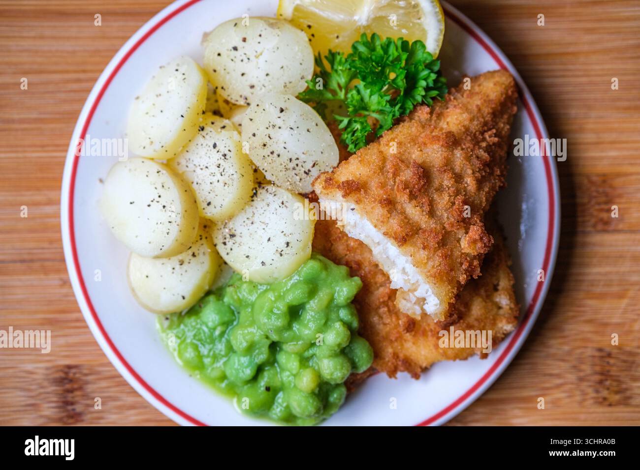 London UK, September 03 2025, Breaded Cod Fillet With Sliced New ...