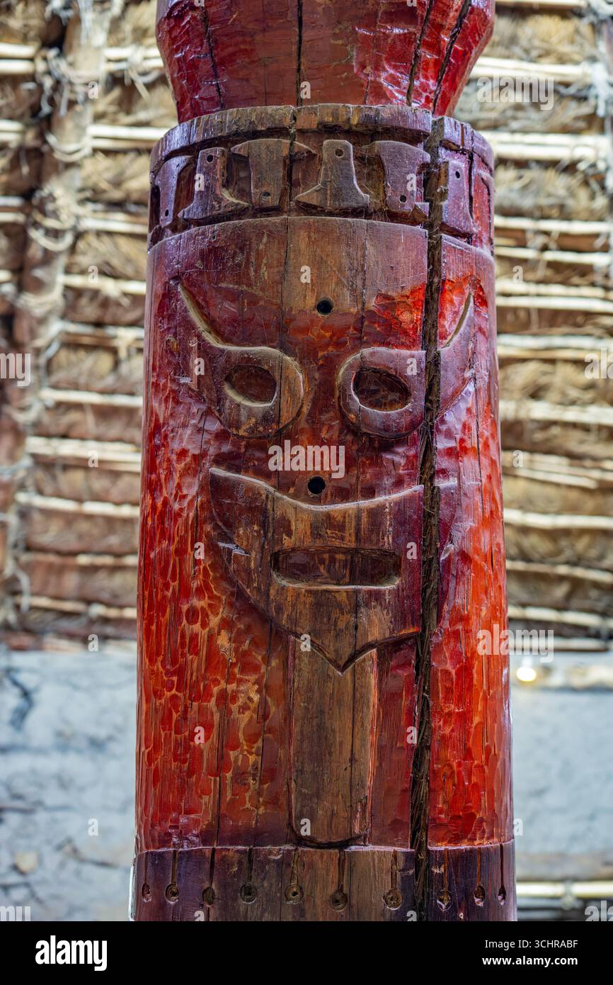 Carved center post of a traditional Sierra Region bahareque or hut in ...
