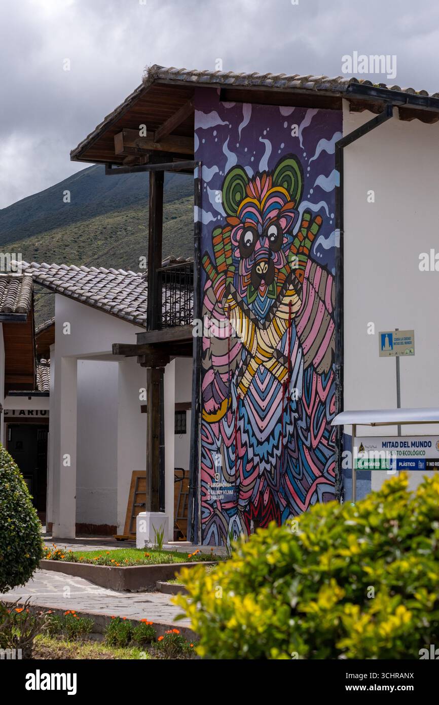 The colorful stylized bear on a wall mural painting in Mitad del Mundo ...