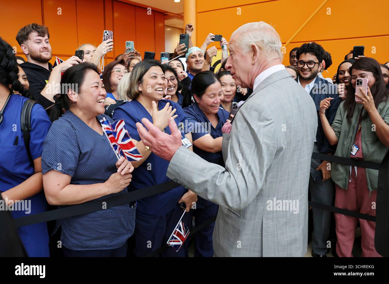 Britain's King Charles is greeted by medical students as he officially ...