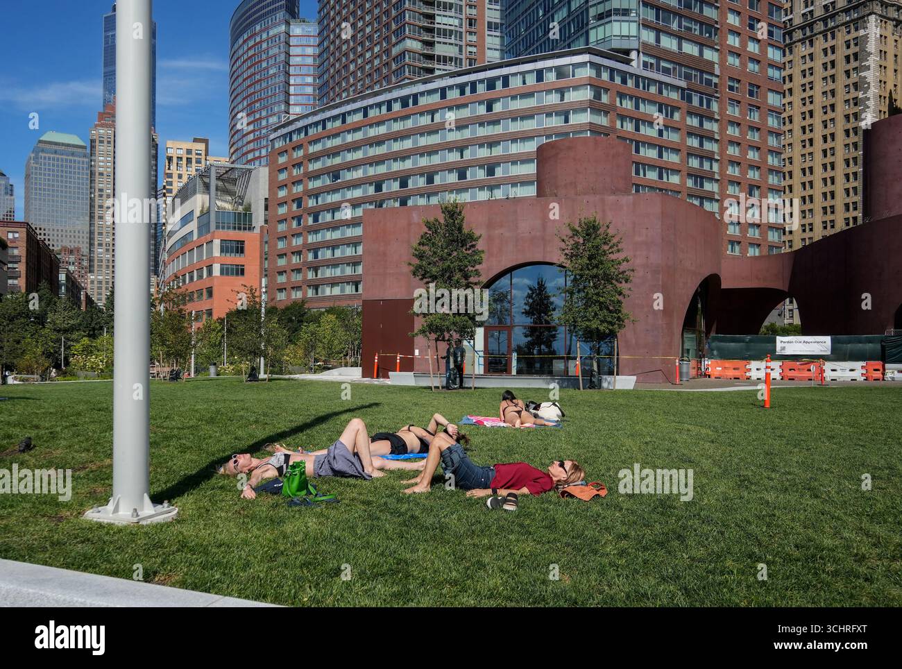 People relax on the lawn over the Labor Day weekend in the newly ...