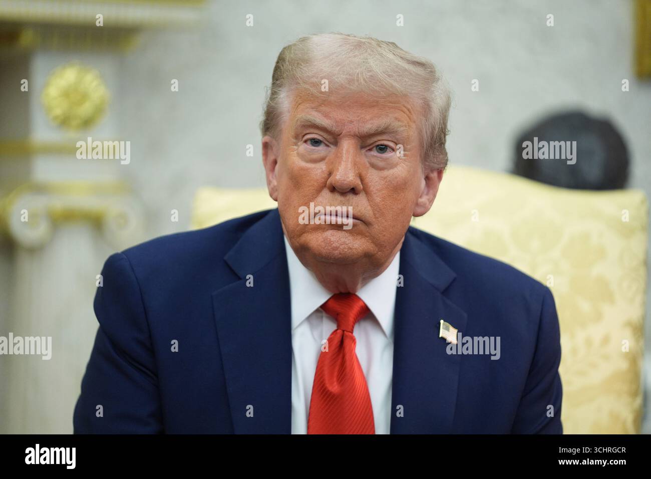 President Donald Trump listens during a meeting with Polish President ...