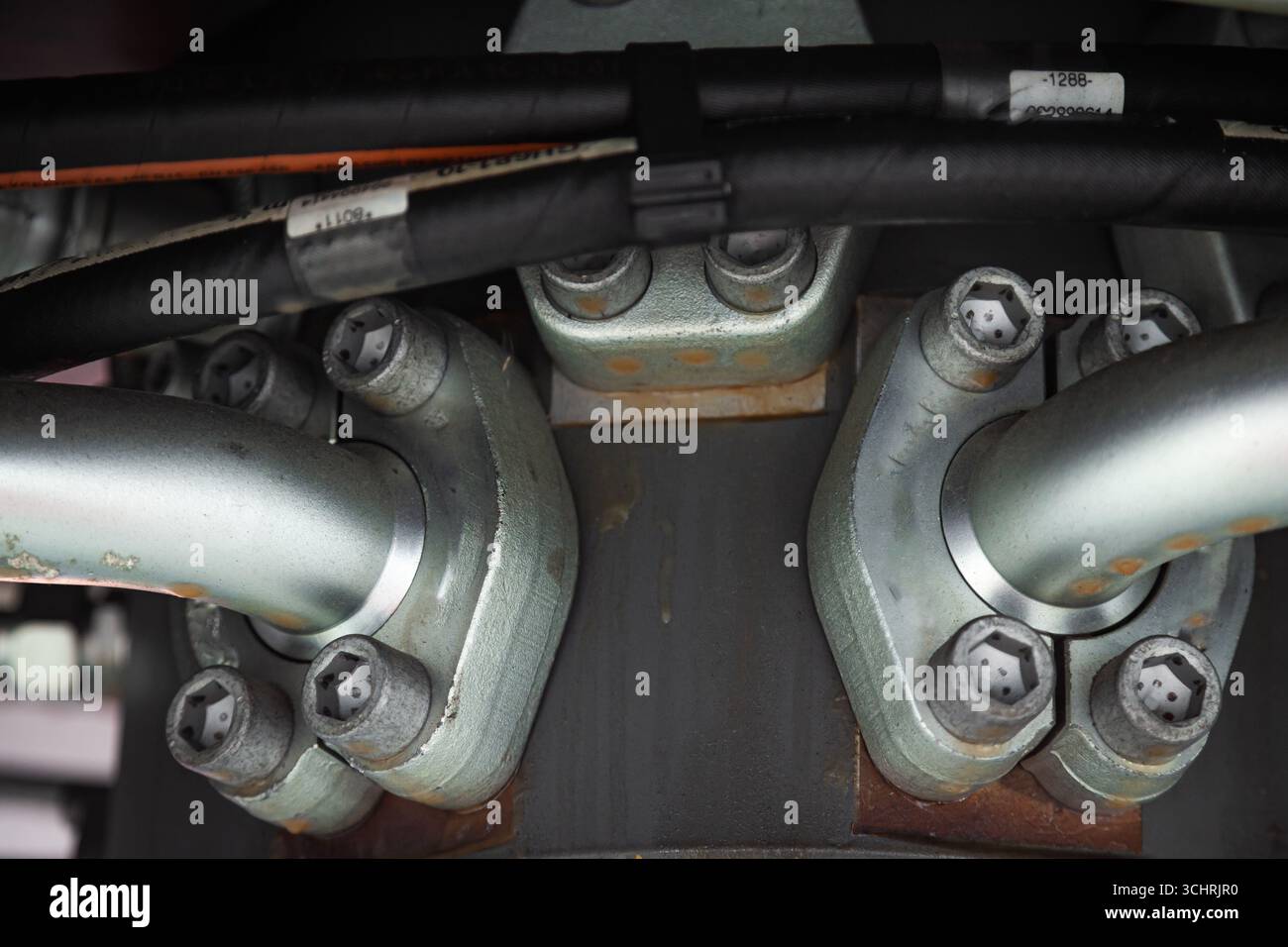 High pressure hydraulic hose system connected with steel pipes and ...