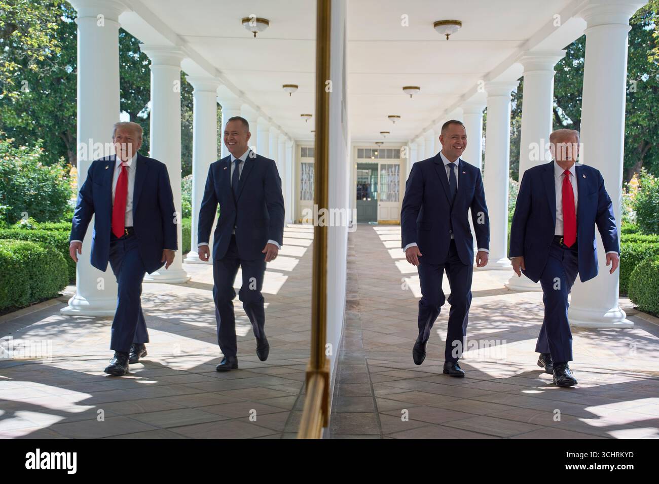 President Donald Trump walks with Polish President Karol Nawrocki to a ...