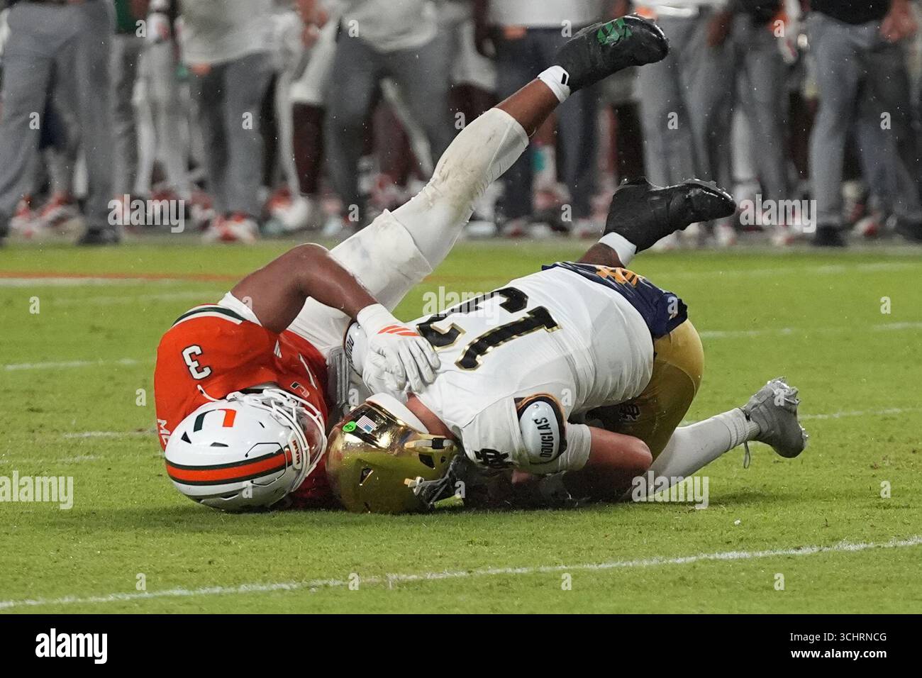 Miami defensive lineman Akheem Mesidor, (3) defends against Notre Dame ...